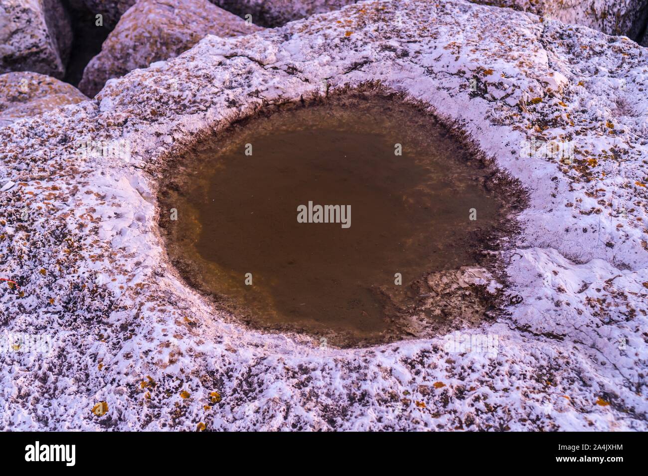 Puddle of dirty water on a marble stone Stock Photo - Alamy
