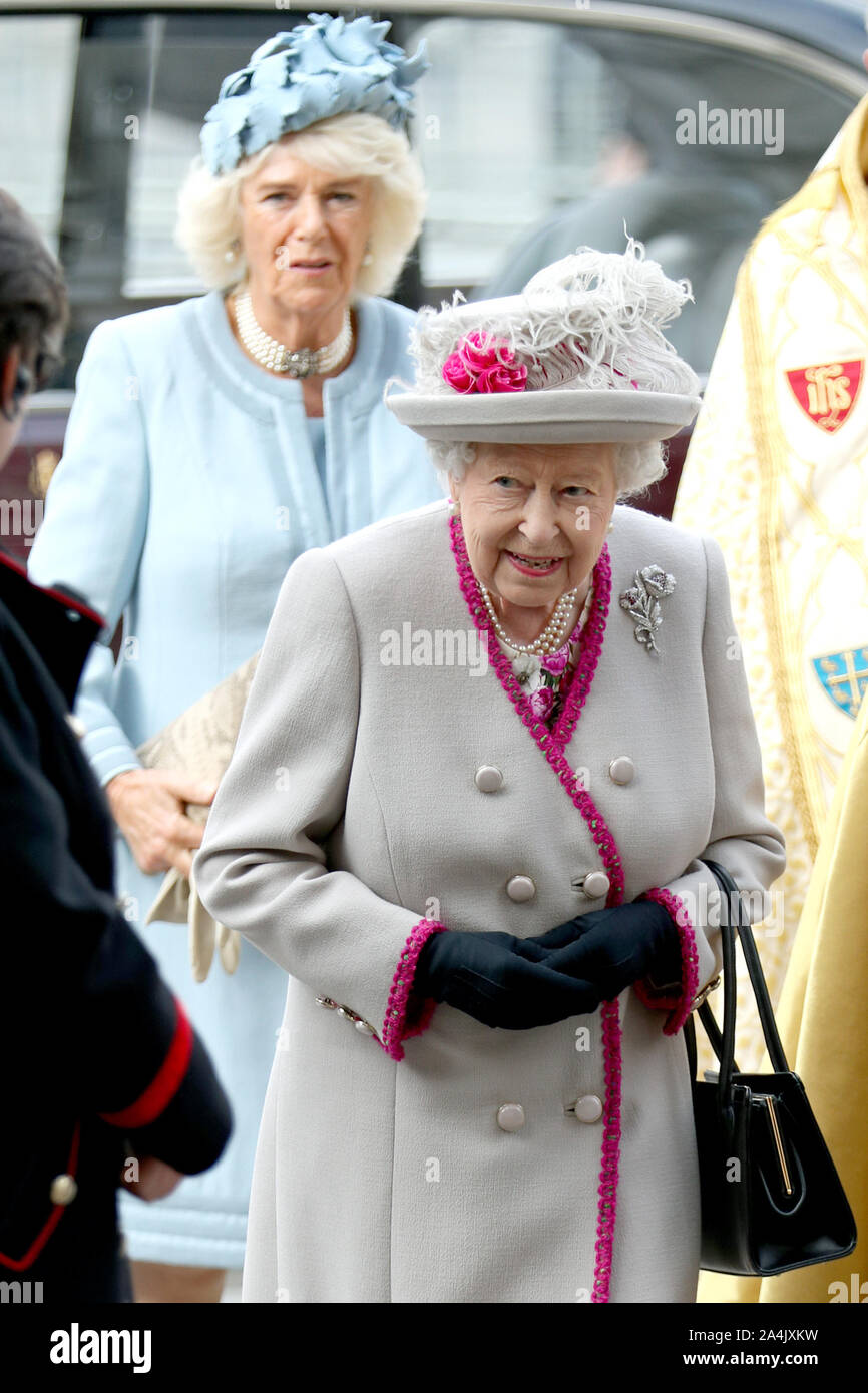 Queen Elizabeth II, accompanied by the Duchess of Cornwall, arrives for ...