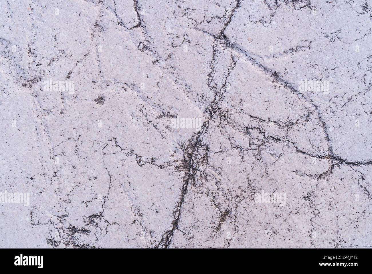 White stone with small cracks on the surface Stock Photo - Alamy