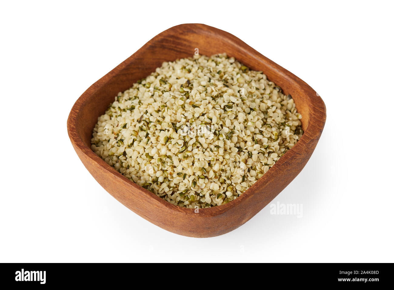 Organic shelled hemp seeds in wooden bowl isolated on white background ...