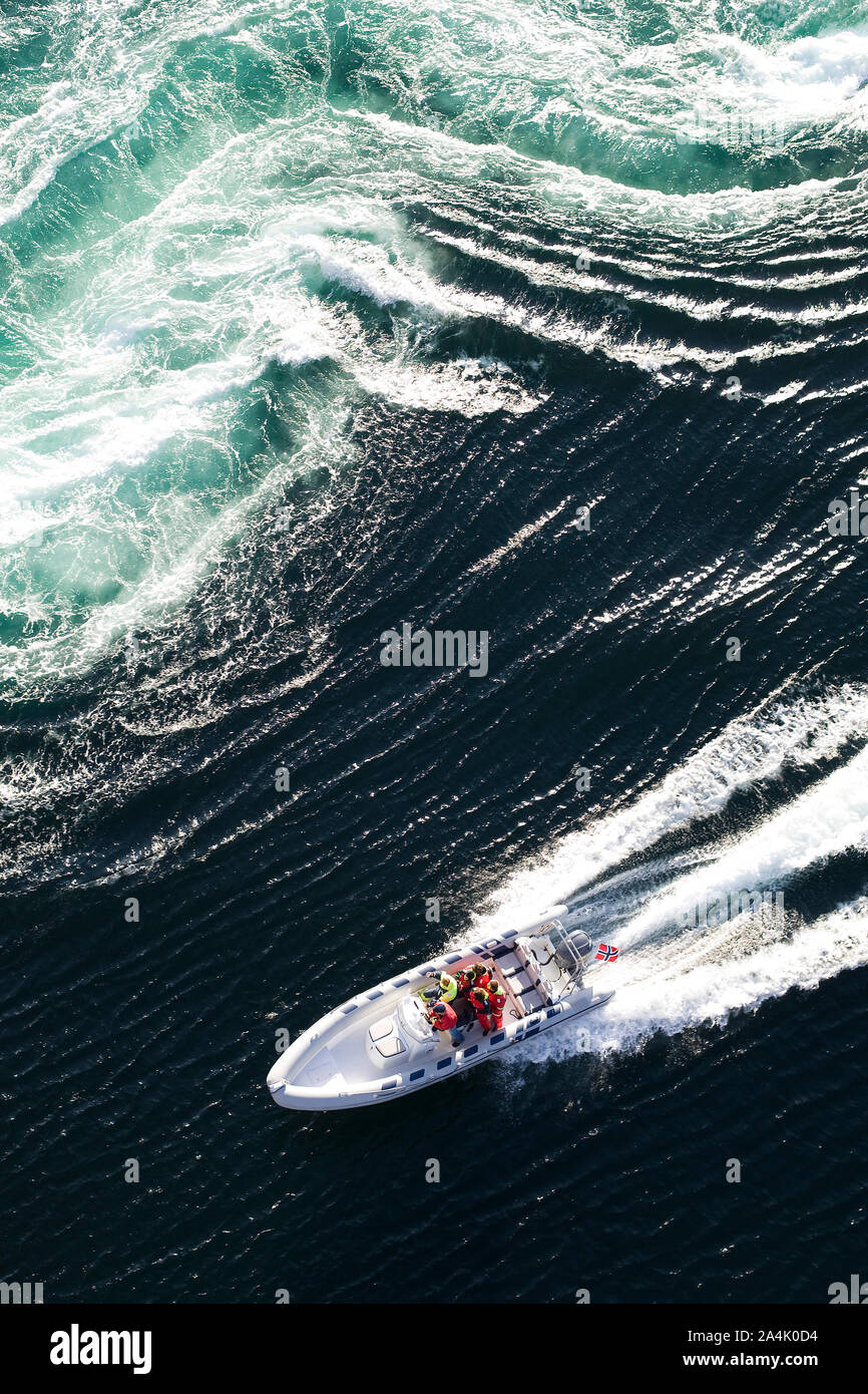 Group of People on motorboat Stock Photo - Alamy
