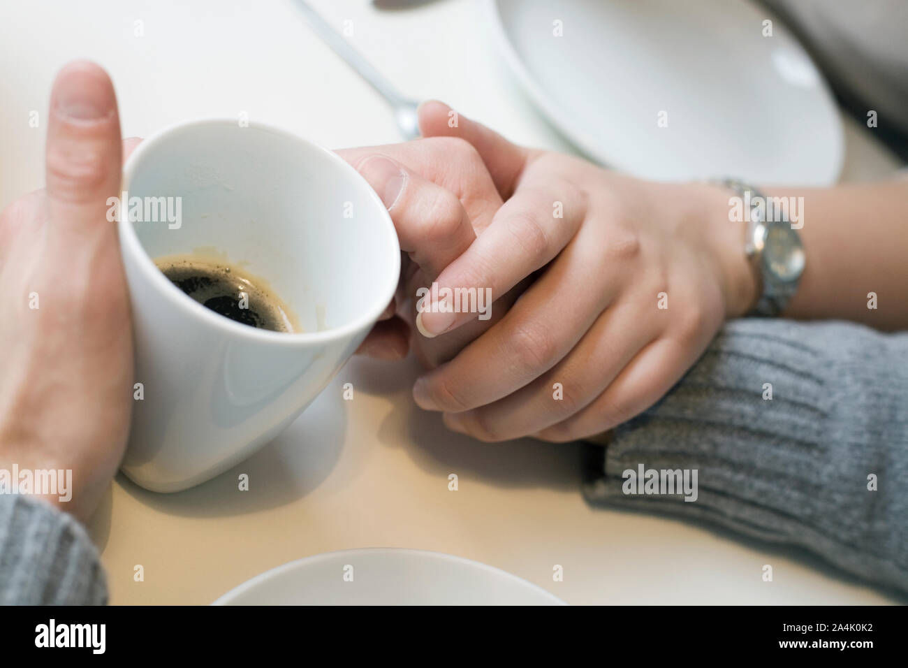 Couple in love drinking coffee Stock Photo - Alamy