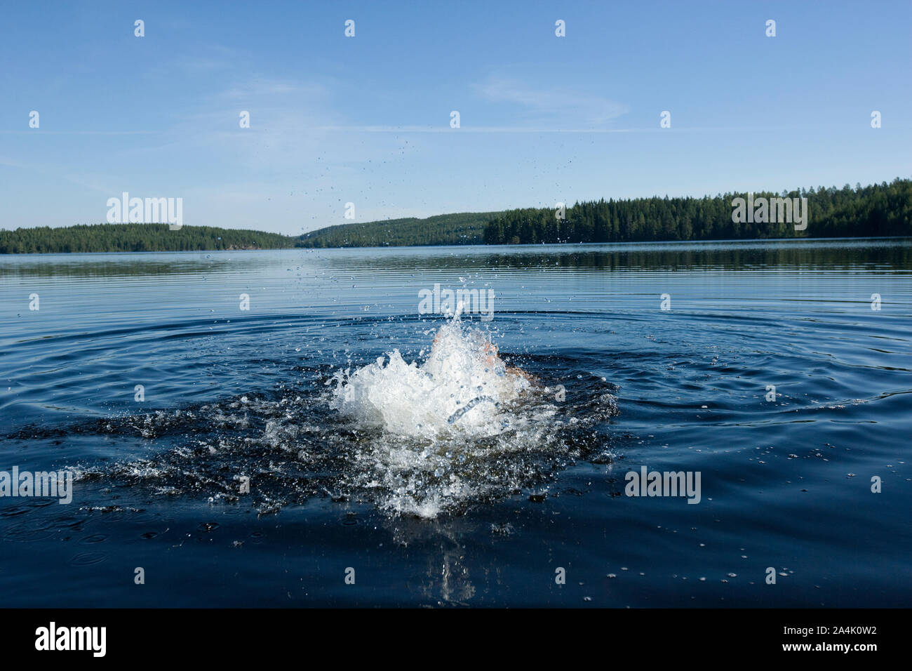 People swimming in nature hi-res stock photography and images - Alamy