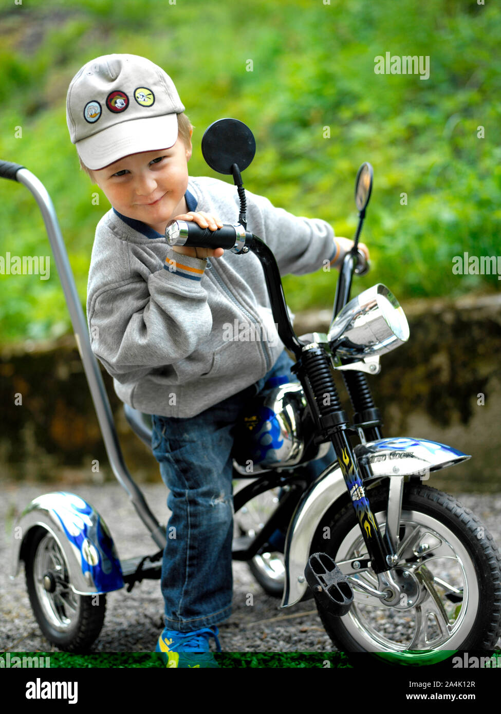 Boy with bike Stock Photo - Alamy