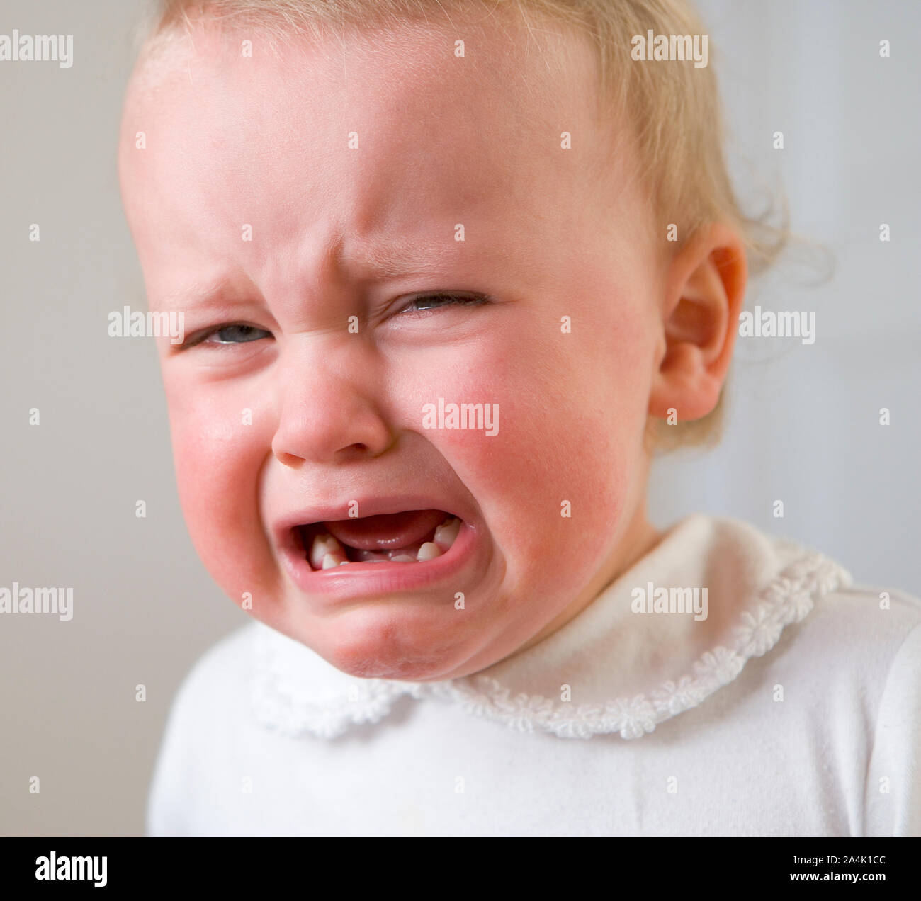 Baby boy crying Stock Photo - Alamy