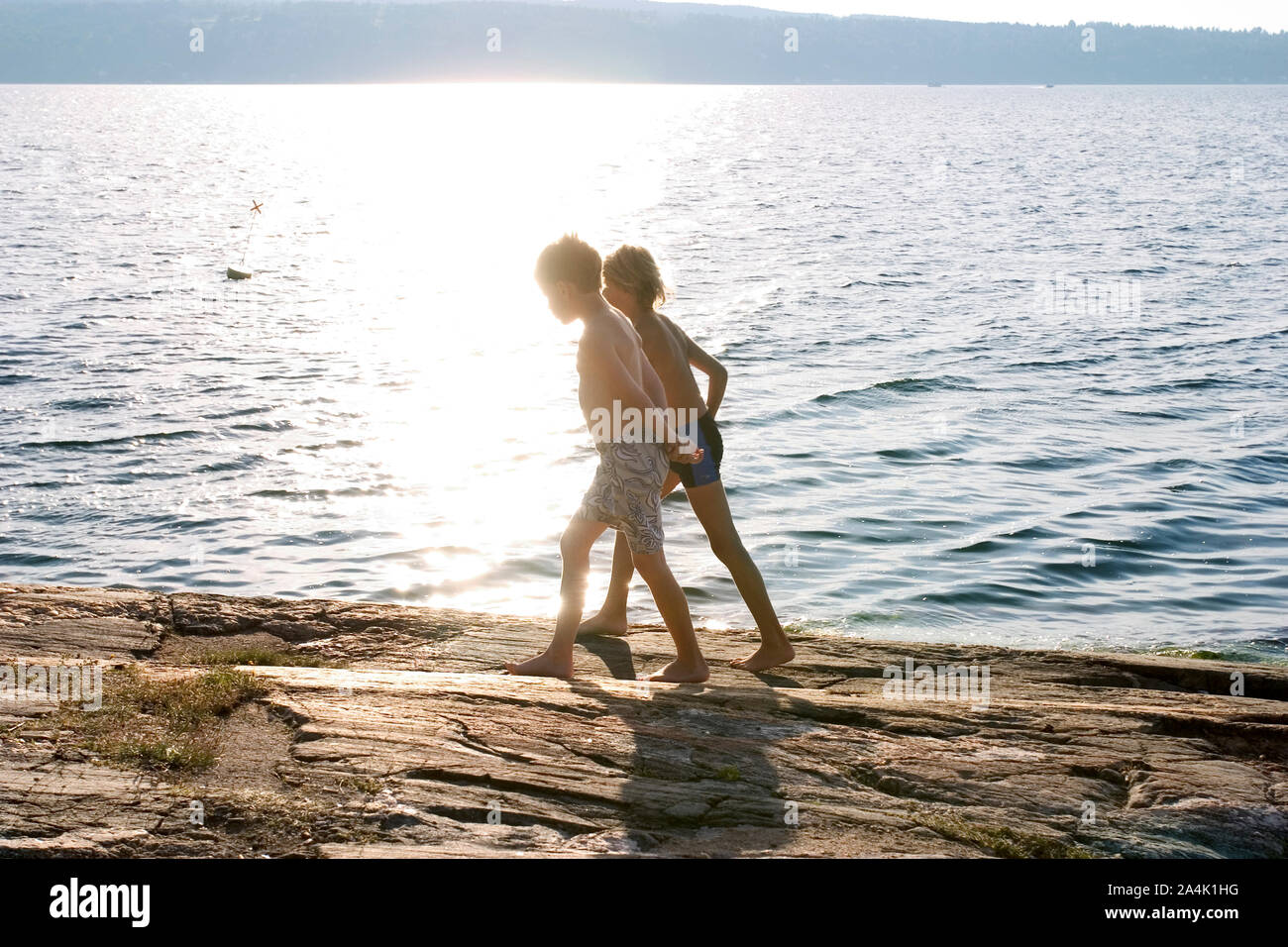 Children by the sea Stock Photo - Alamy