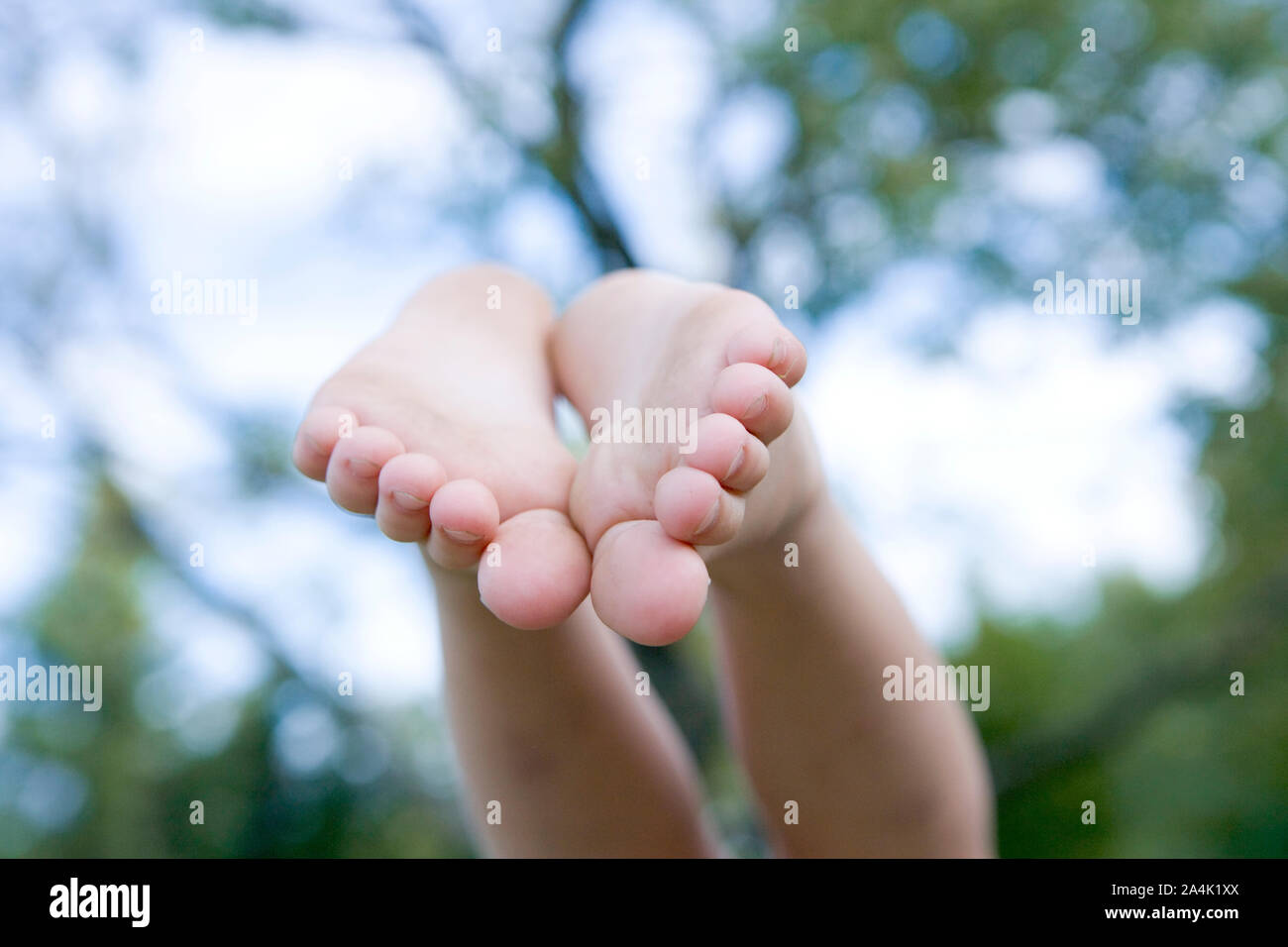 Toes in the air Stock Photo - Alamy