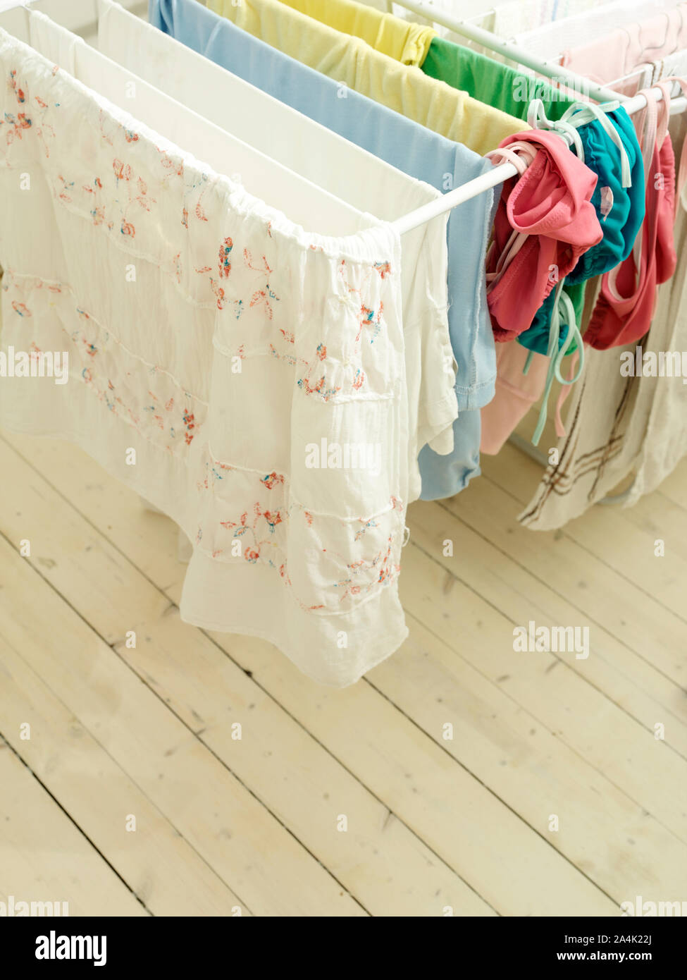 Drying clothes - routine Stock Photo - Alamy