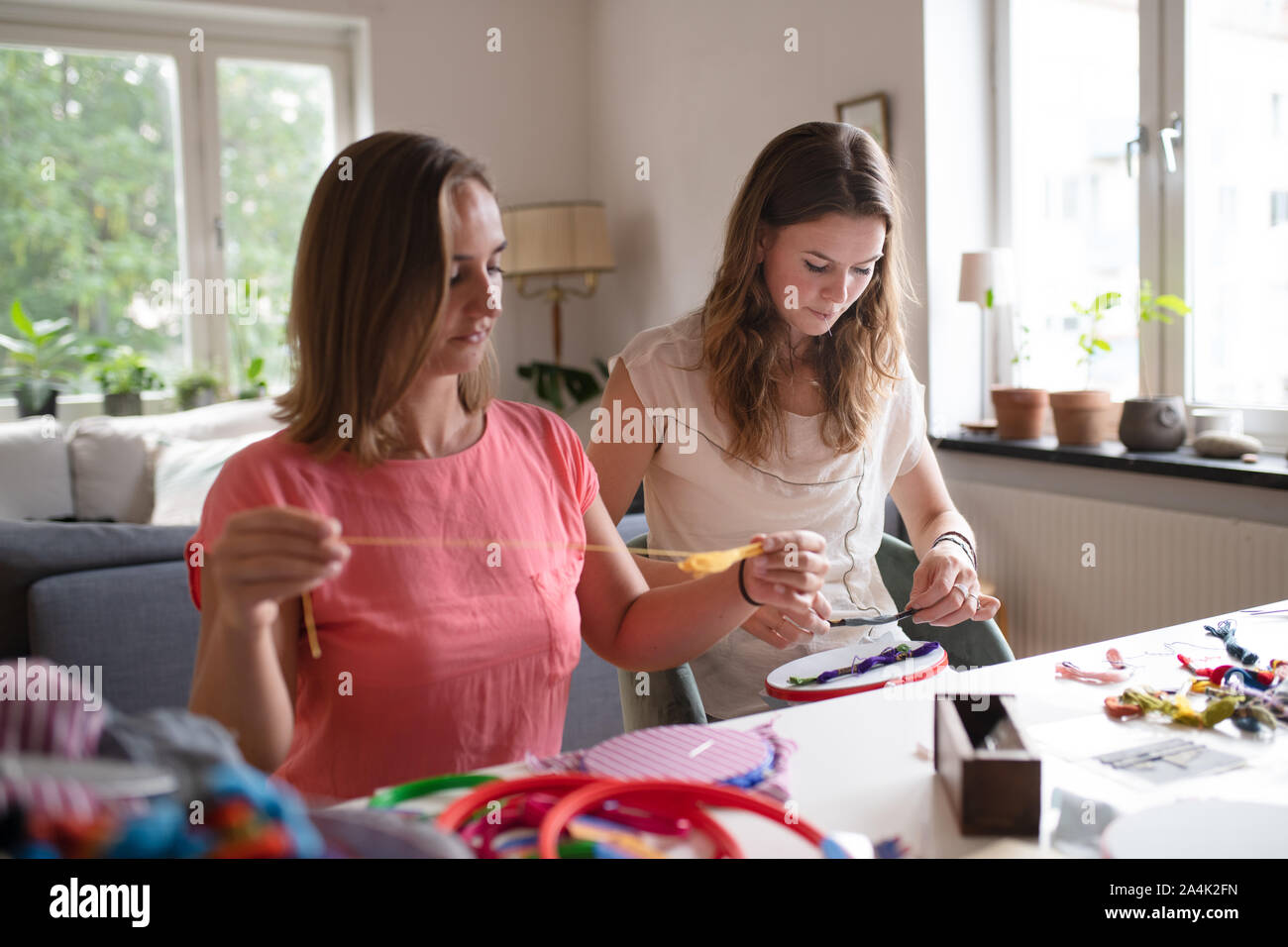 Group of women at a cross-stitching class Stock Photo - Alamy