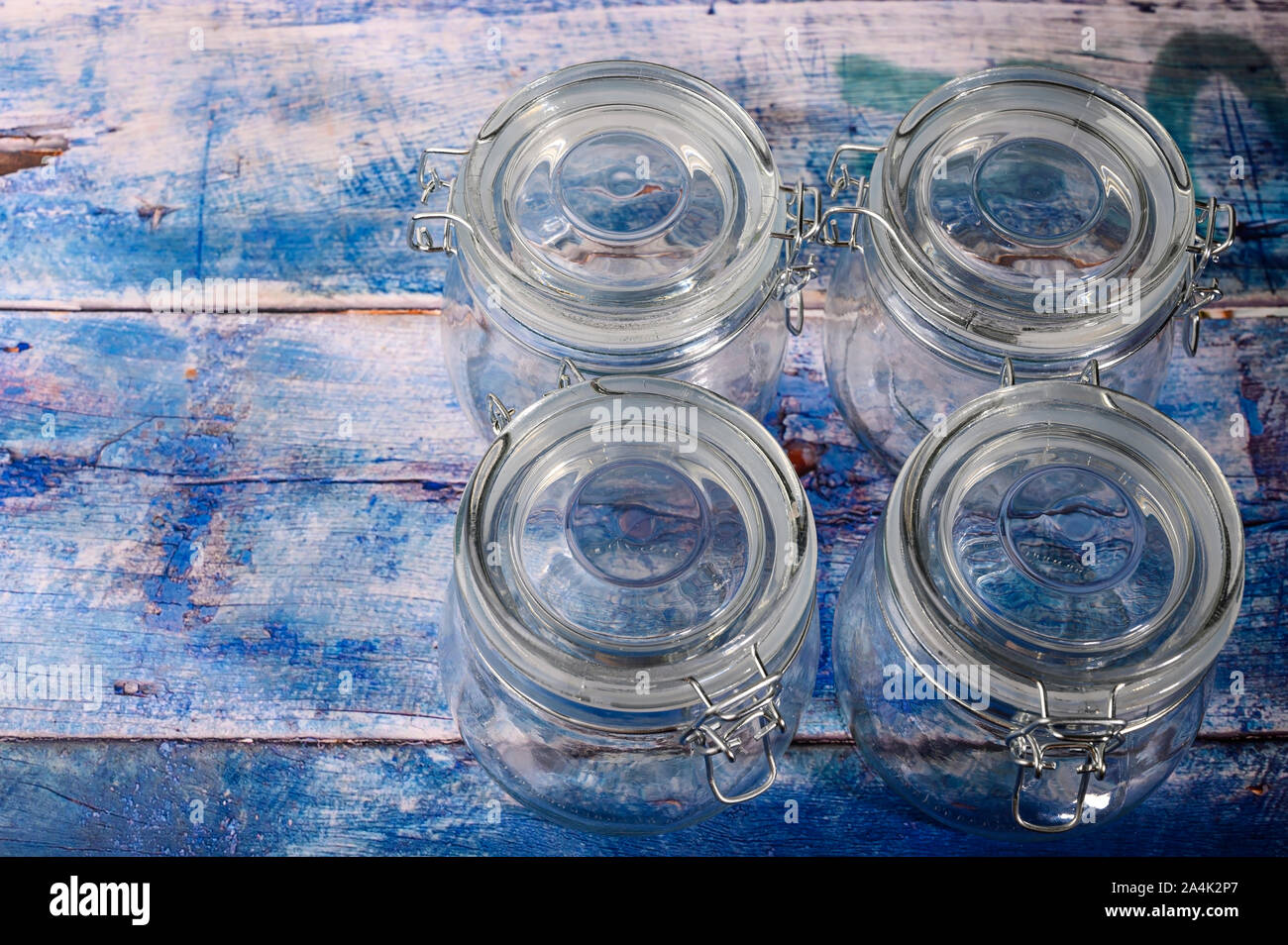Glass jar with lid and metal lock for storing spices Stock Photo - Alamy