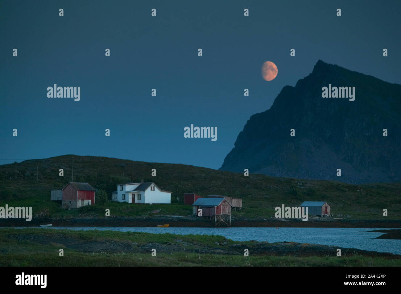 Moon and houses Stock Photo - Alamy