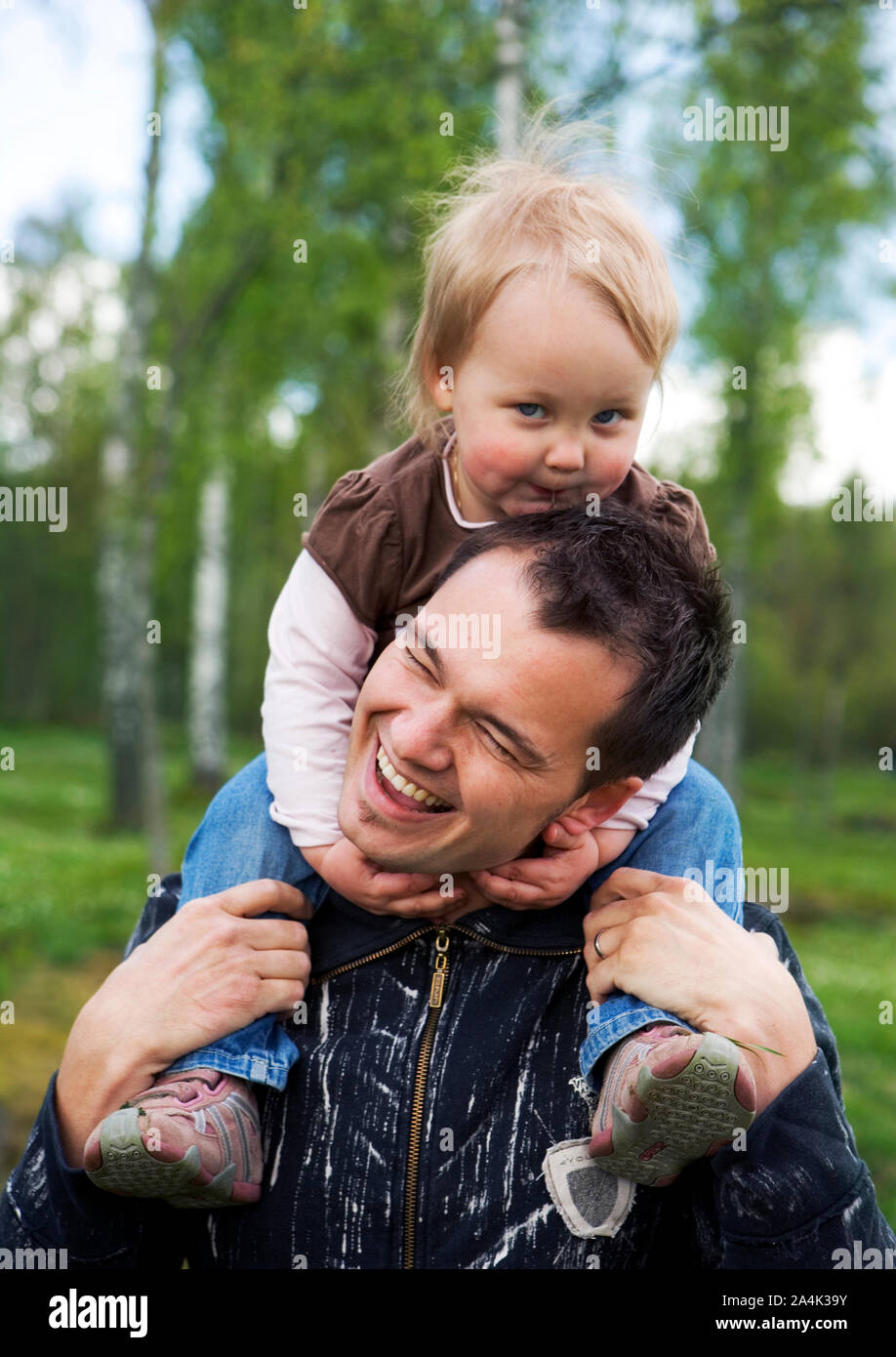 Blond boy with his father Stock Photo - Alamy