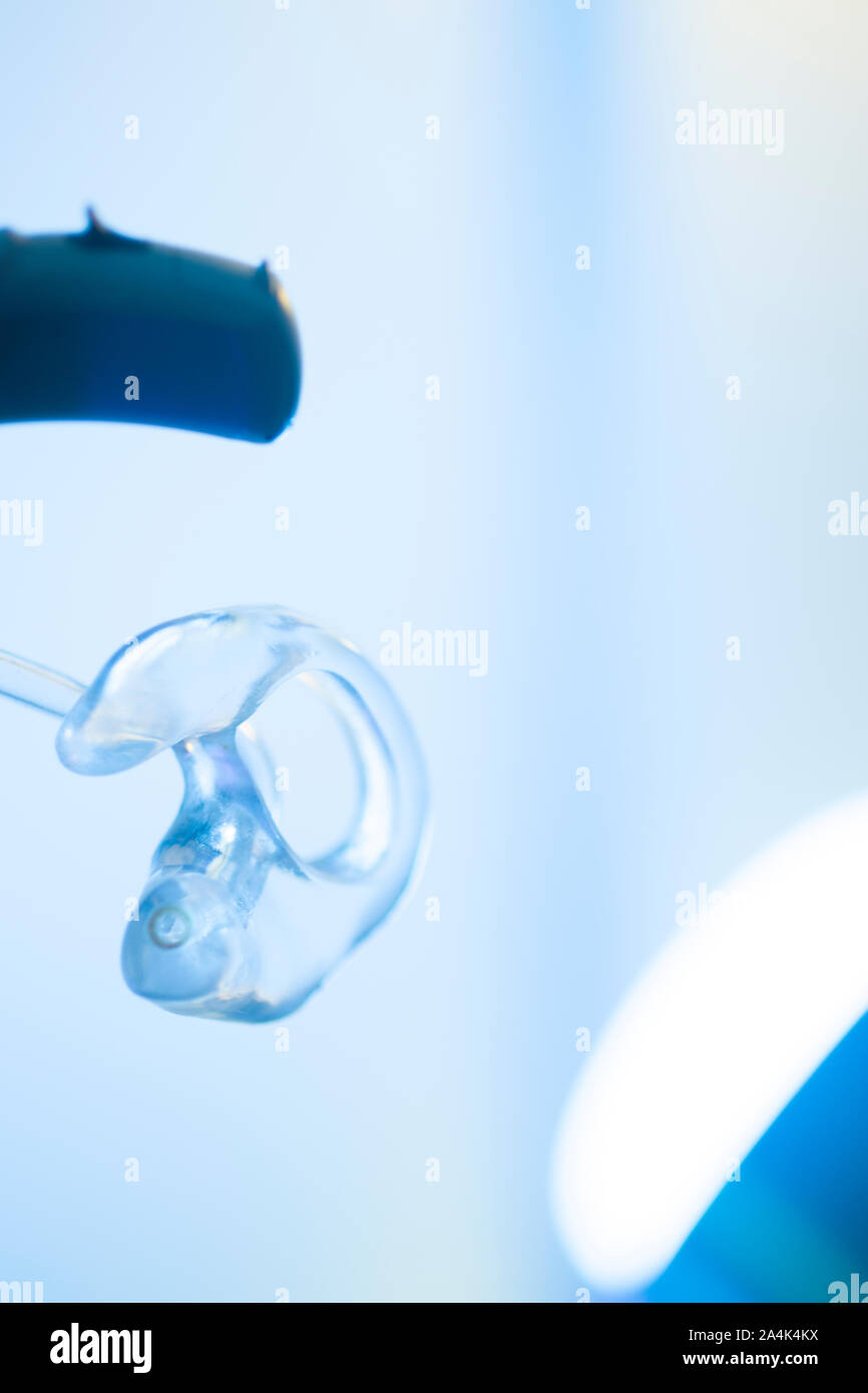 Modern digital hearing aid for deafness and deaf people Stock Photo - Alamy