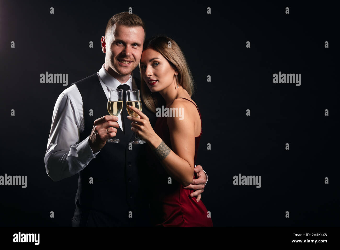 attractive fashion romantic couple having fun in the party, close up ...