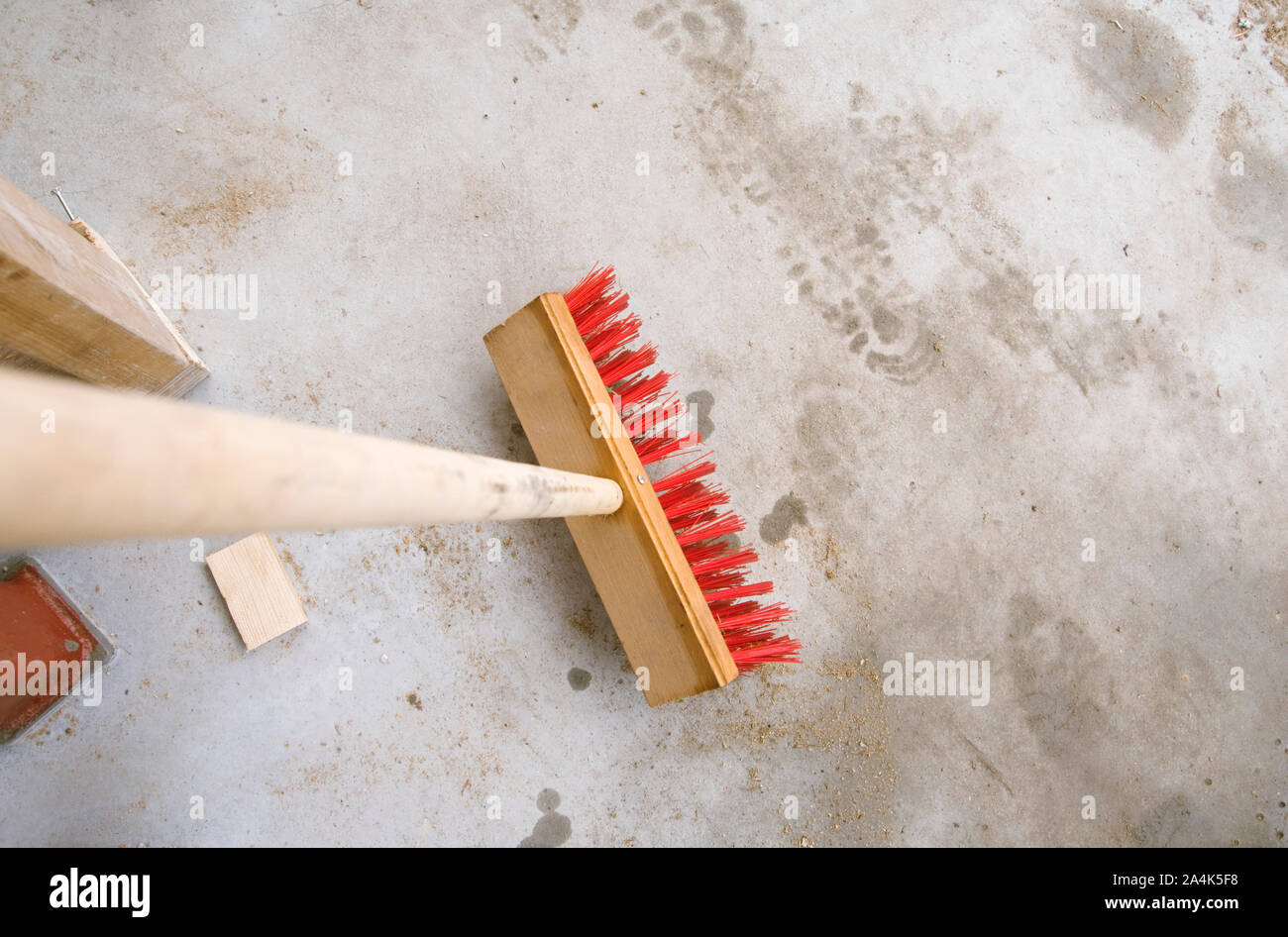 Broom. Concrete floor. Construction site Stock Photo - Alamy