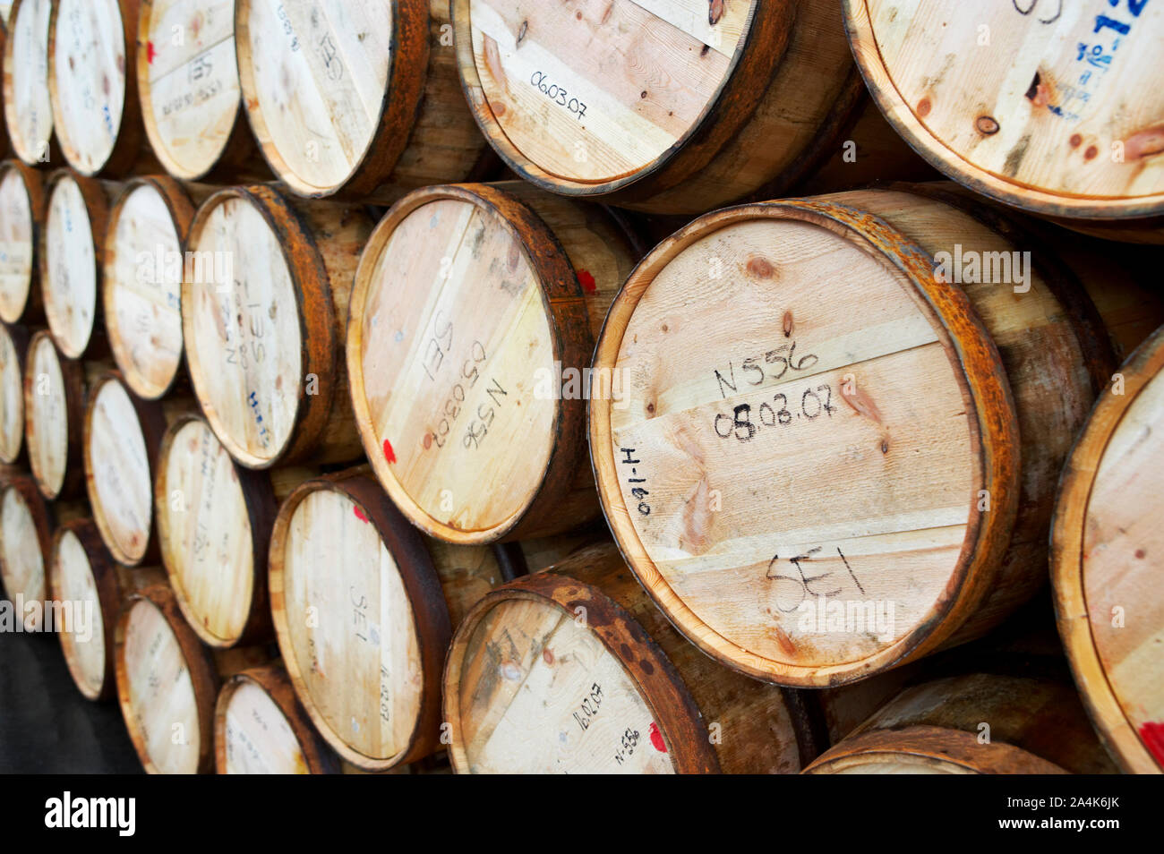 Fish barrels. Stored coalfish. RÂØst fishing port, Lofoten Stock Photo ...