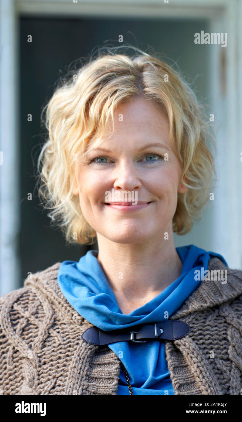 Woman with blue skarf Stock Photo - Alamy