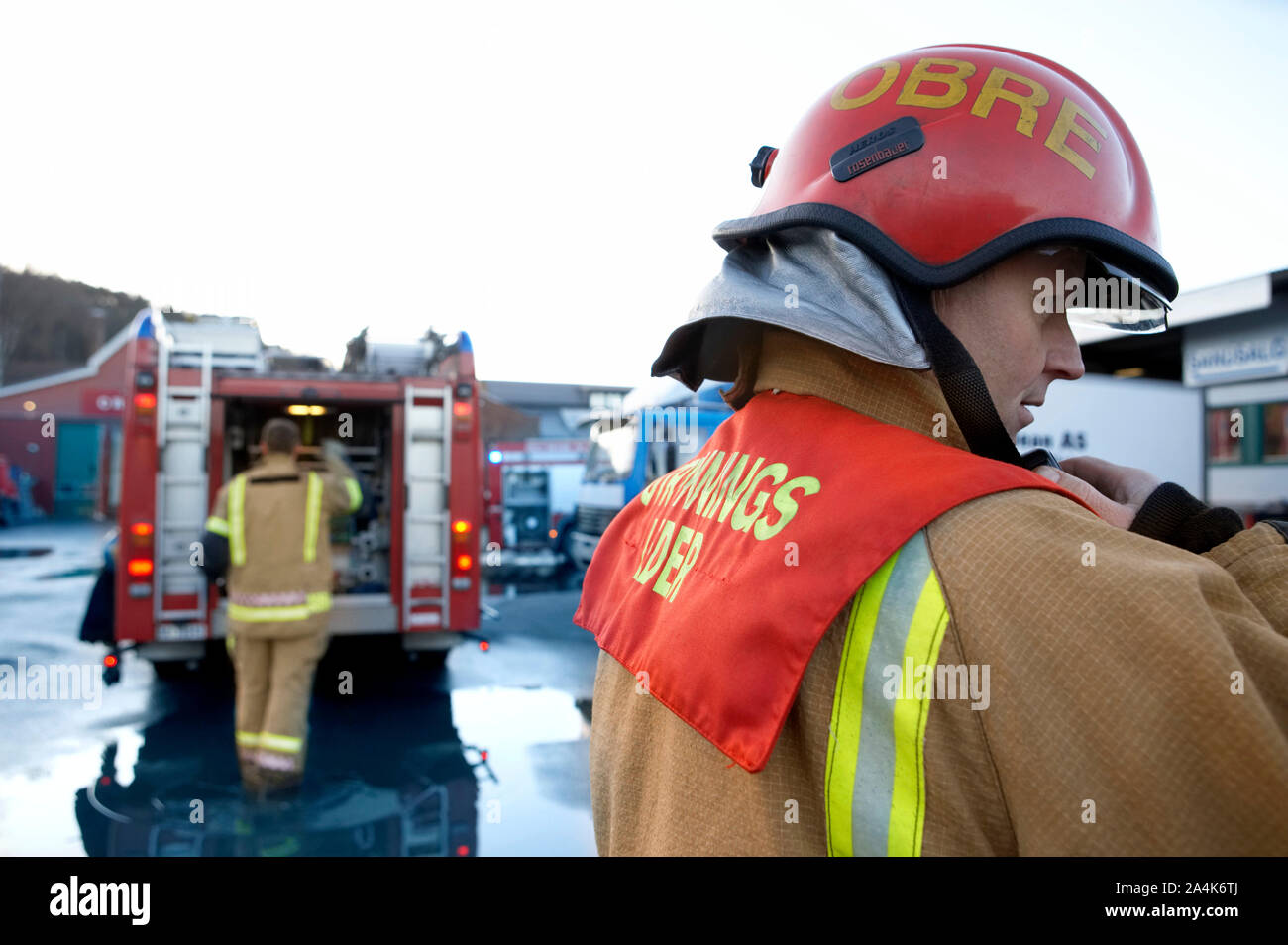 Firemen at work Stock Photo - Alamy