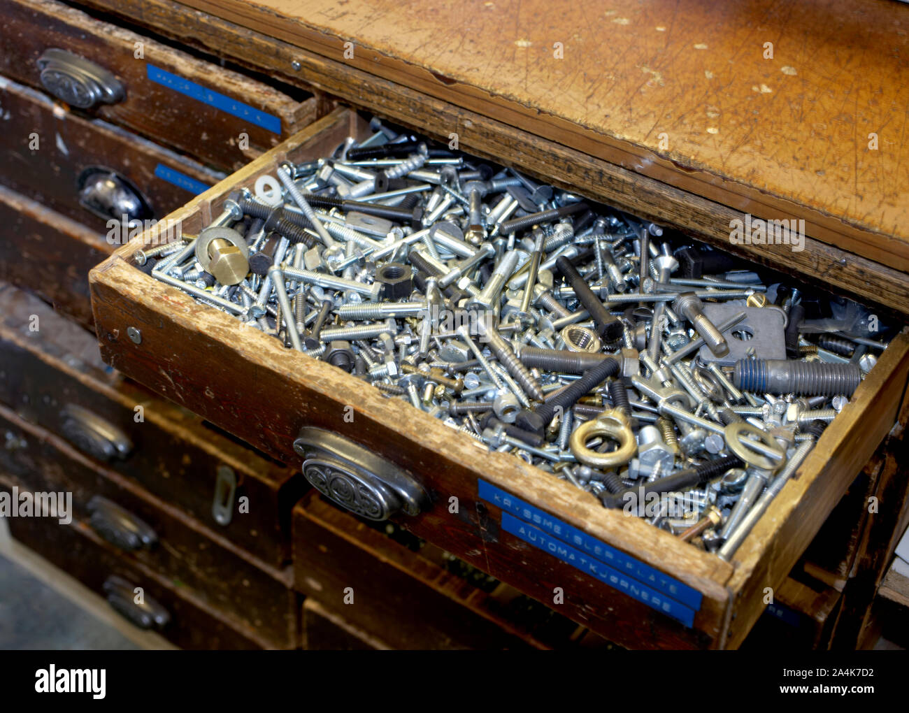 Nails in a chest of drawers - drawer Stock Photo - Alamy