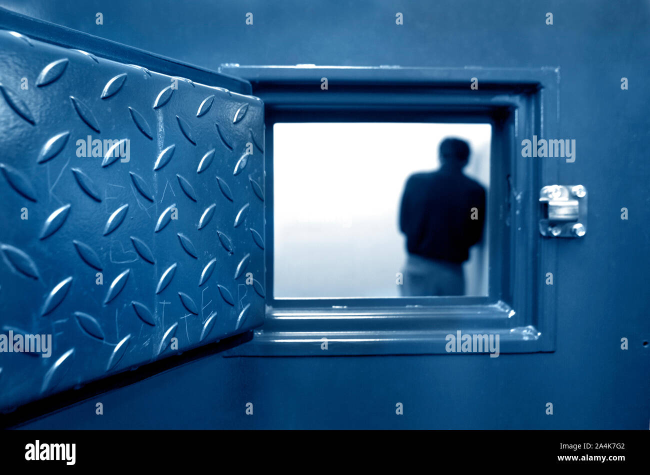 Prisoner/criminal locked up Stock Photo - Alamy