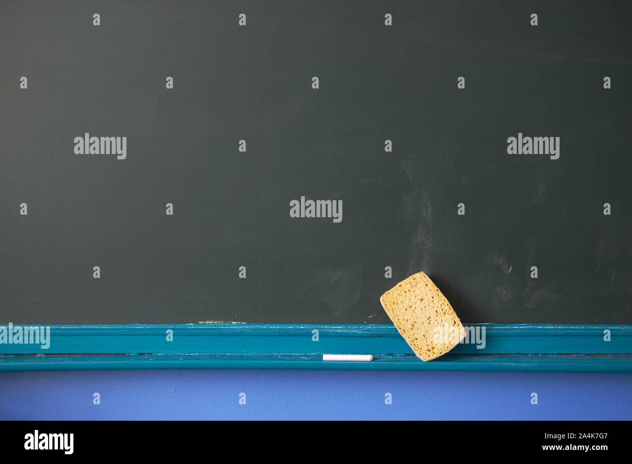 Blackboard and sponge Stock Photo - Alamy