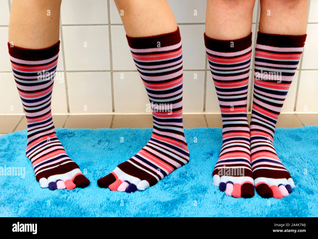Wearing stockings - insecurity uncomfortable - body language Stock ... Wearing stockings - insecurity uncomfortable - body language Stock ...