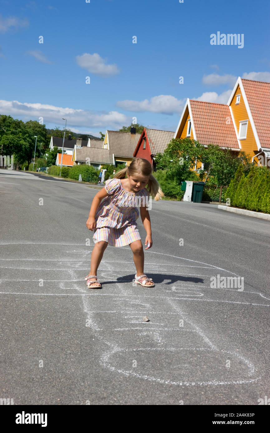 Girls playing hopscotch hi-res stock photography and images - Alamy