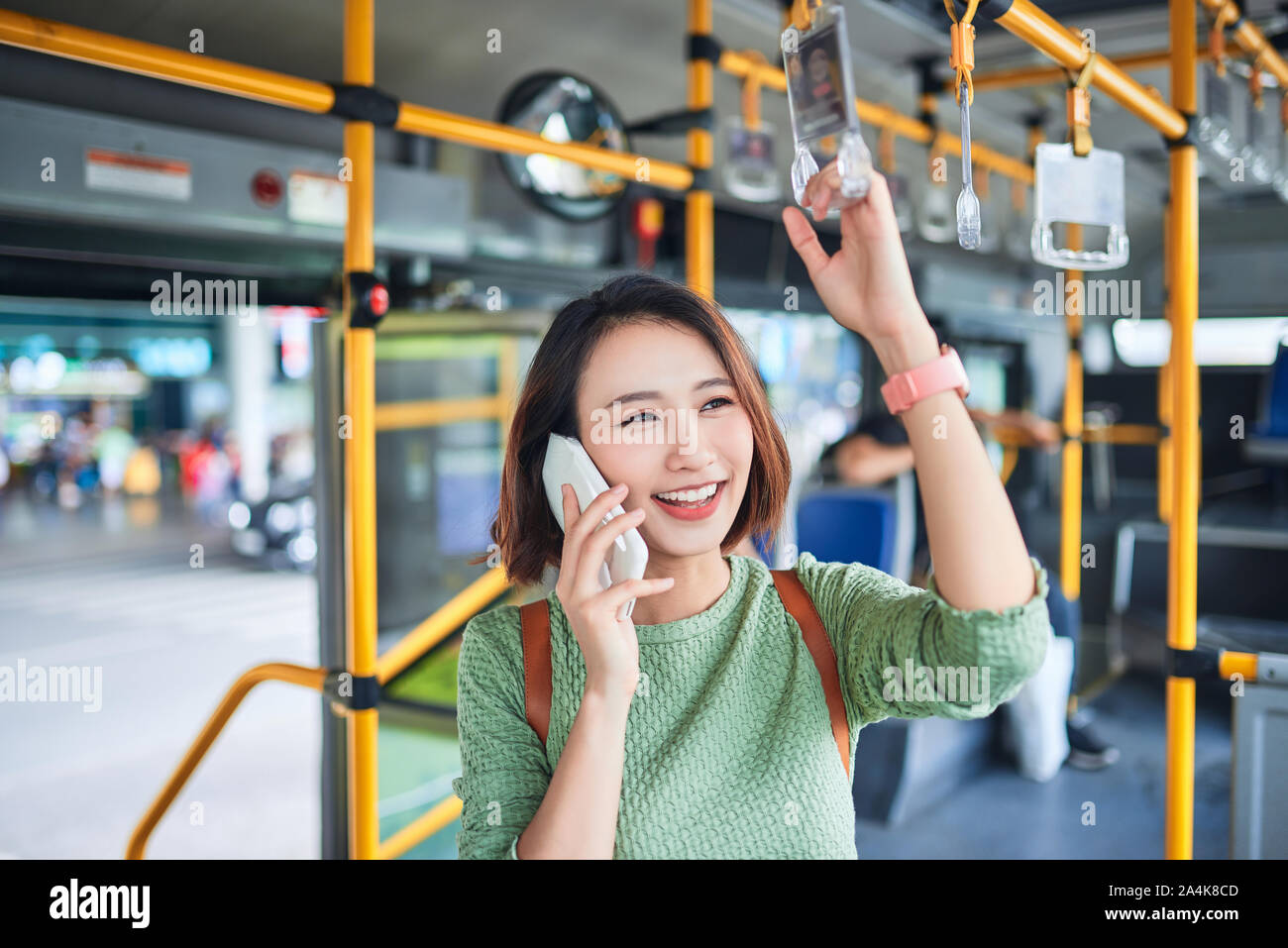 Talking on bus hi-res stock photography and images - Alamy