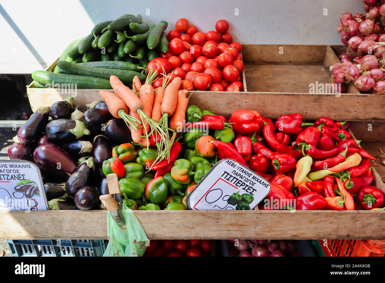 Fresh vegetables at a market stall Stock Photo - Alamy