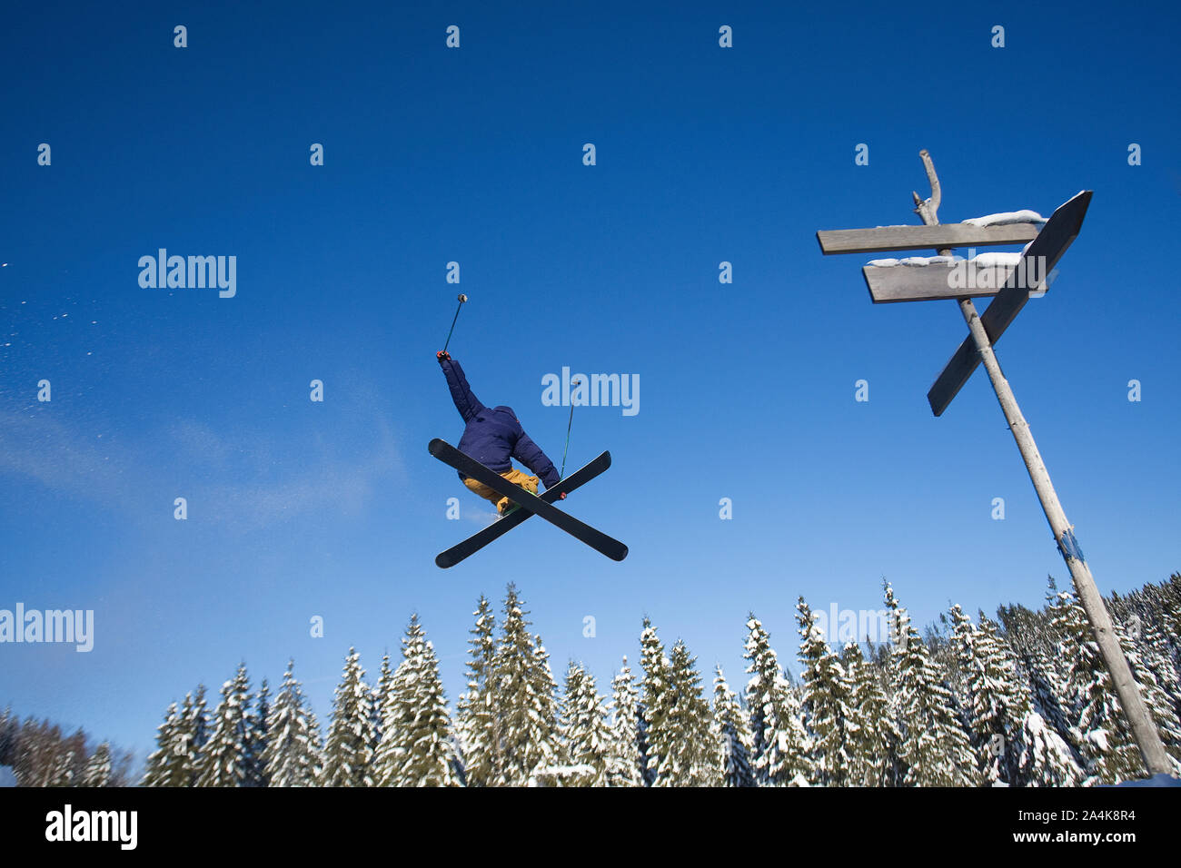 Skier Flying Through The Air Stock Photo - Alamy