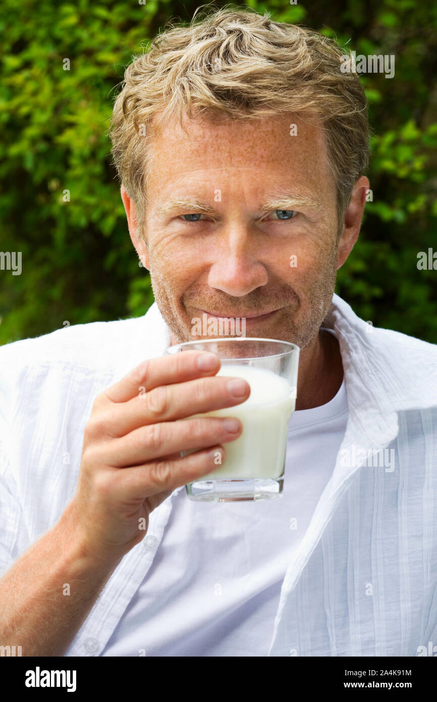 Man drinking milk Stock Photo - Alamy