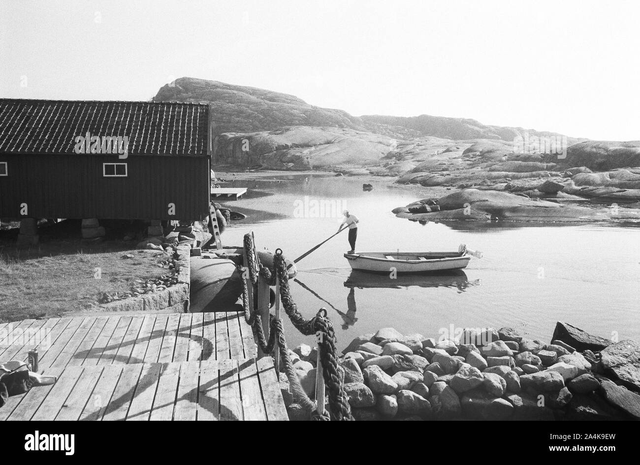 Man in rowboat hi-res stock photography and images - Alamy