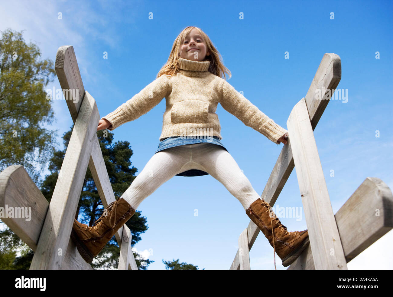 Happy girl playing Stock Photo - Alamy
