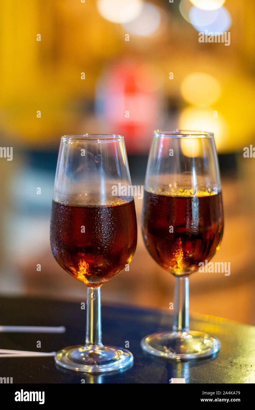 Christmas sherry wine, dry or sweet jerez fortified wine in glasses and ...