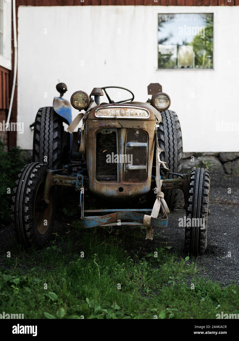 Old tractor in Norway Stock Photo - Alamy