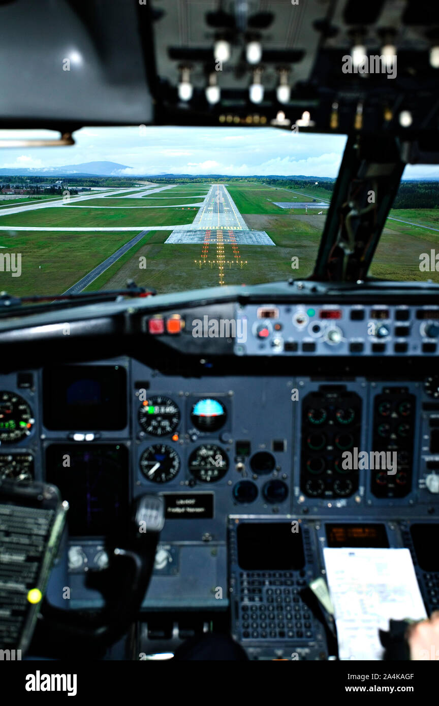 Airplane landing. Cockpit view to runway Stock Photo - Alamy