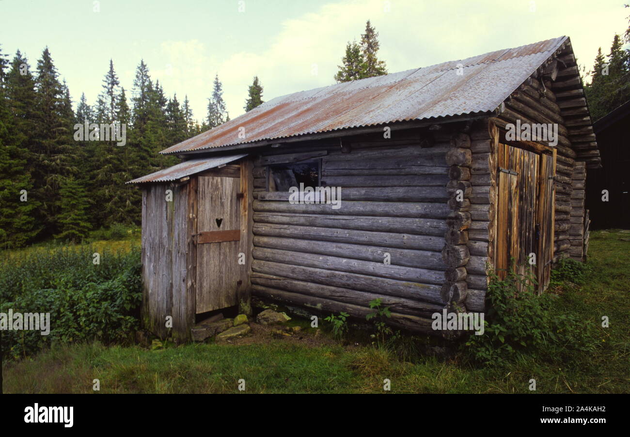 Mountain hut with outhouse Stock Photo - Alamy