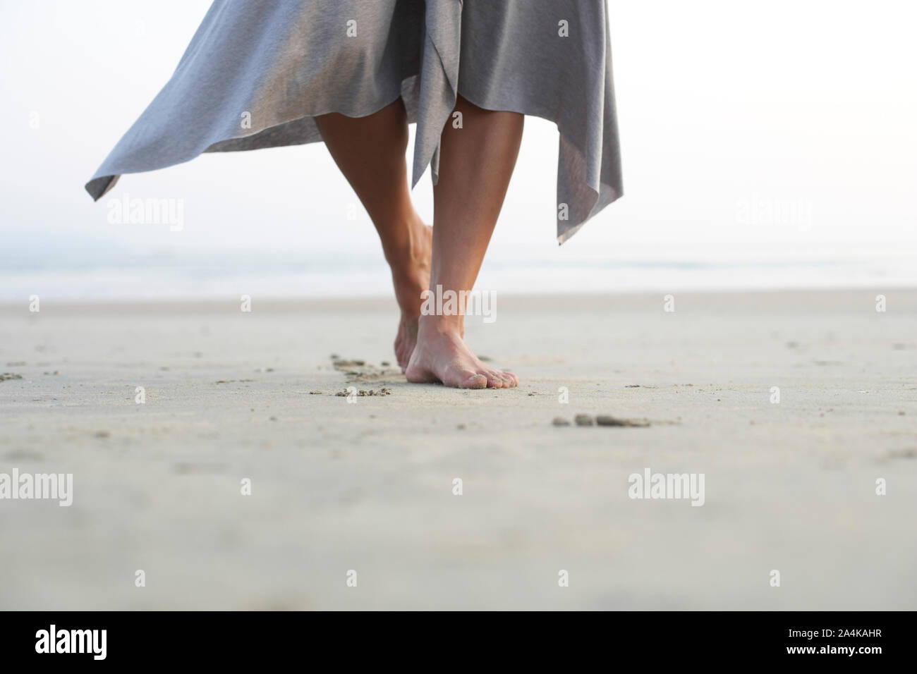 Barefoot in the sand Stock Photo - Alamy