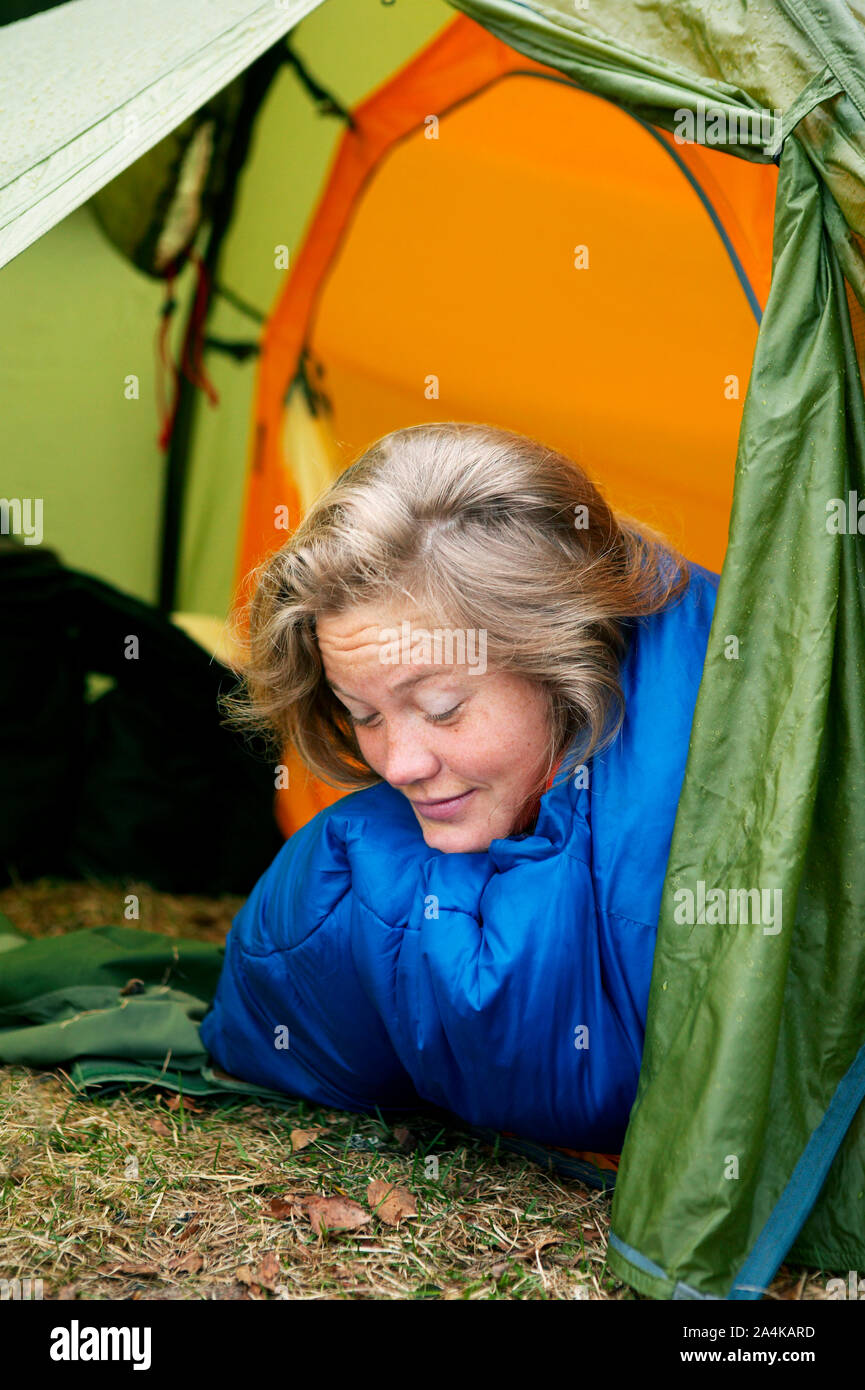 Woman in a tent Stock Photo - Alamy
