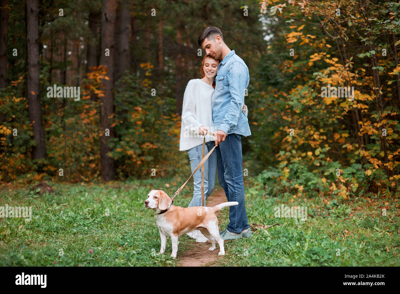 two attractive young people embracing in the park, love, family, free ...