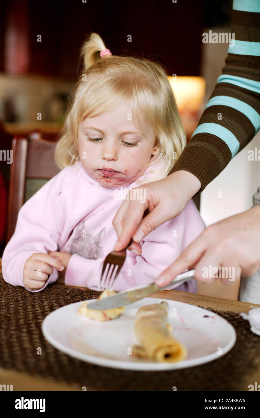 Girl eating waffles hi-res stock photography and images - Alamy
