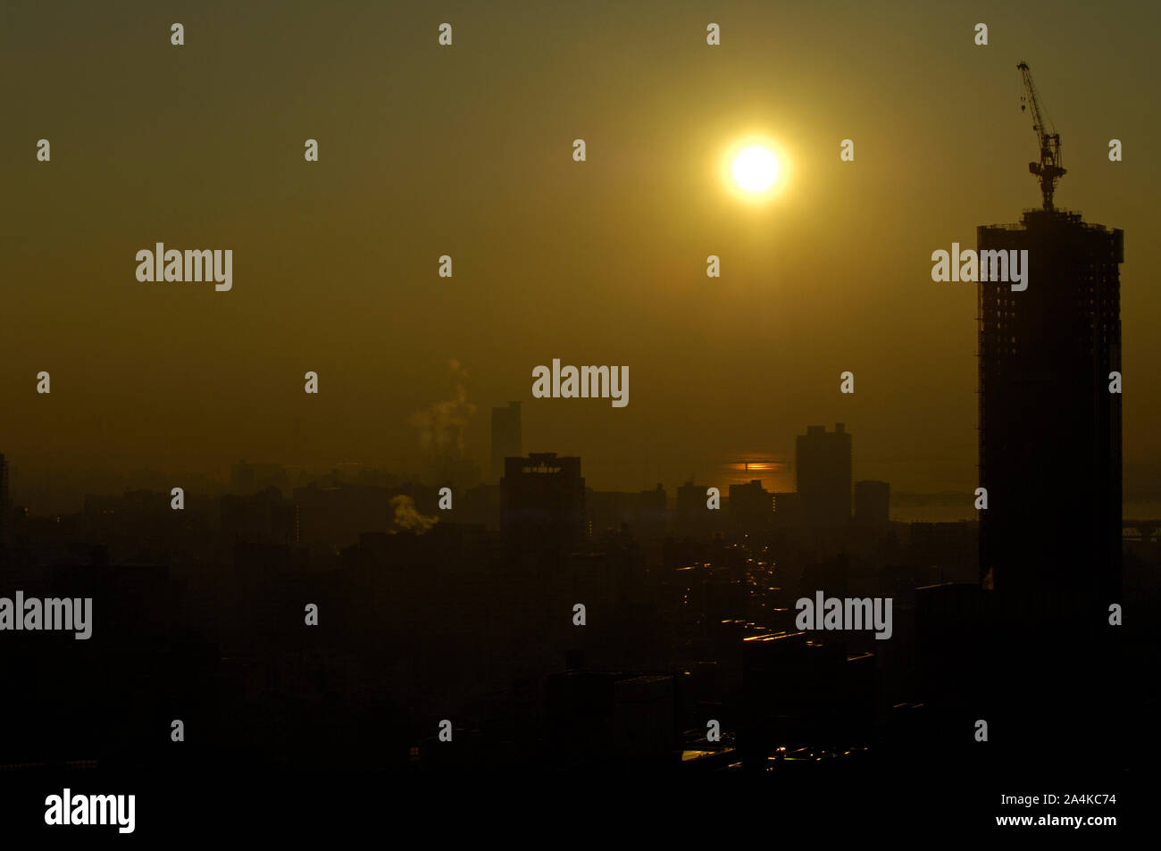Osaka skyline at sunset Stock Photo - Alamy