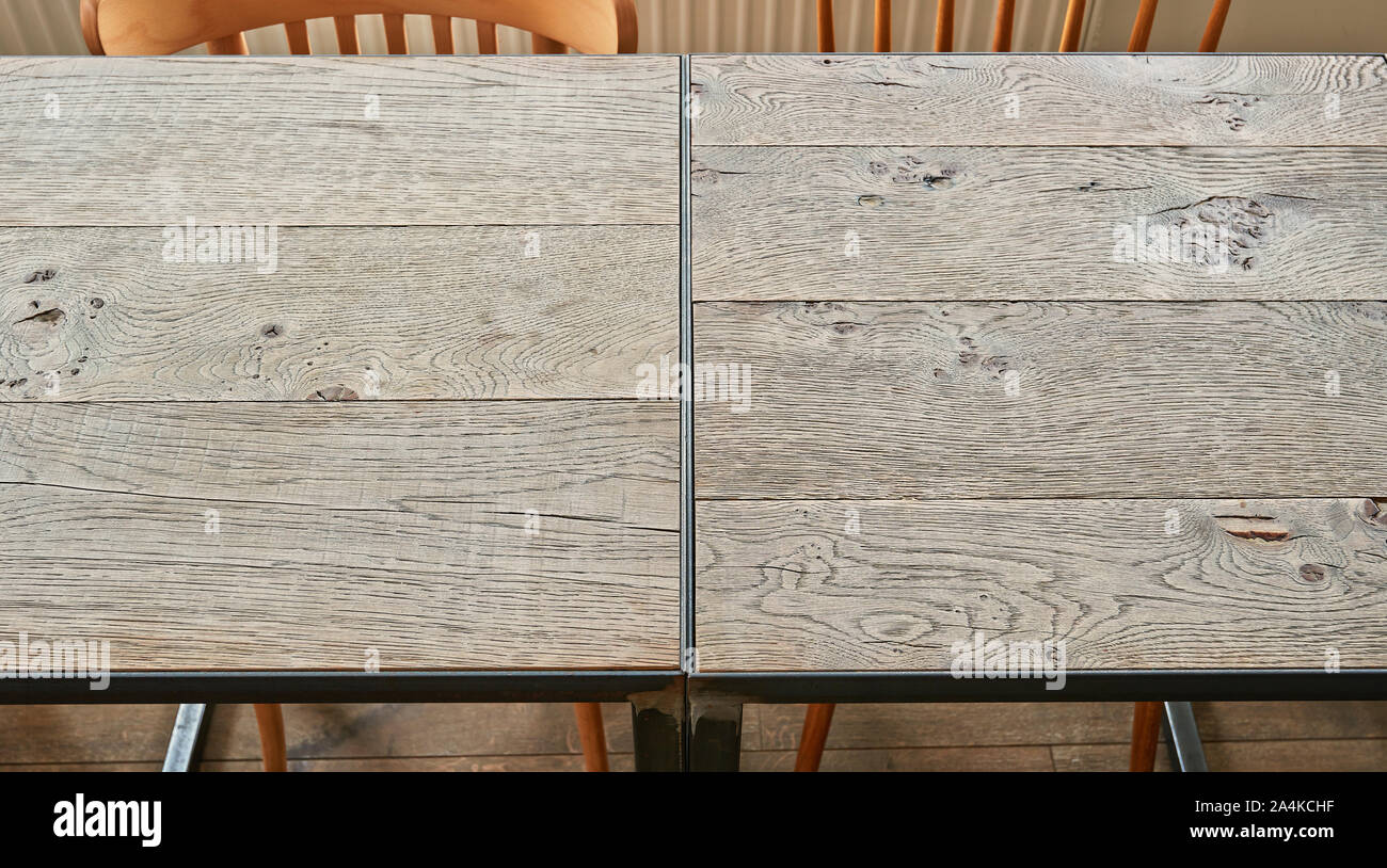 Two rustic wooden table side by side view in perspective Stock Photo ...