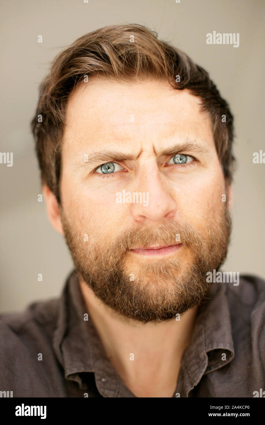 Worried man with beard Stock Photo - Alamy
