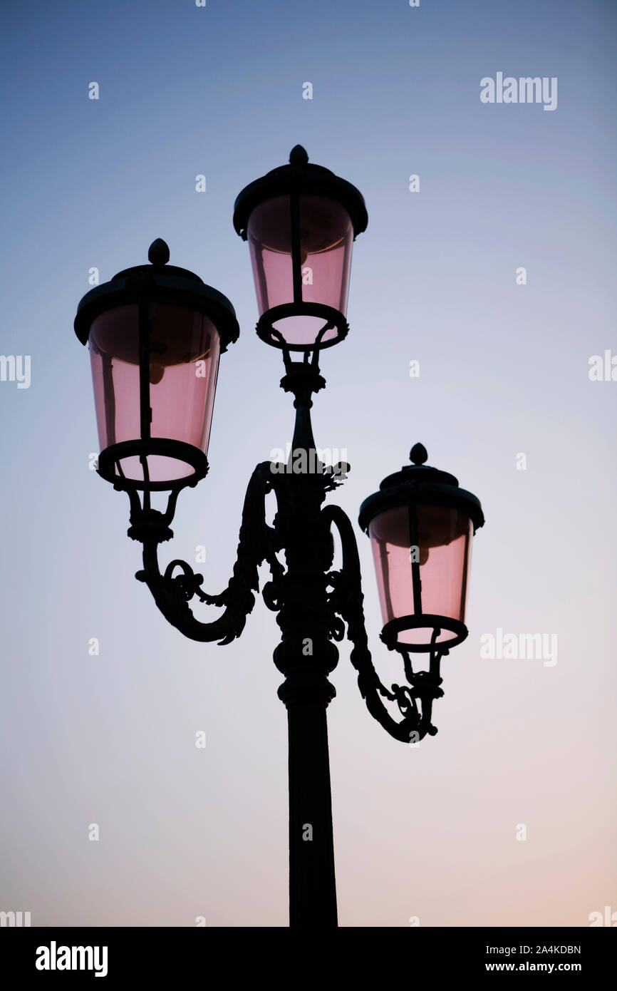 Lamp post at dusk in Venice Stock Photo - Alamy