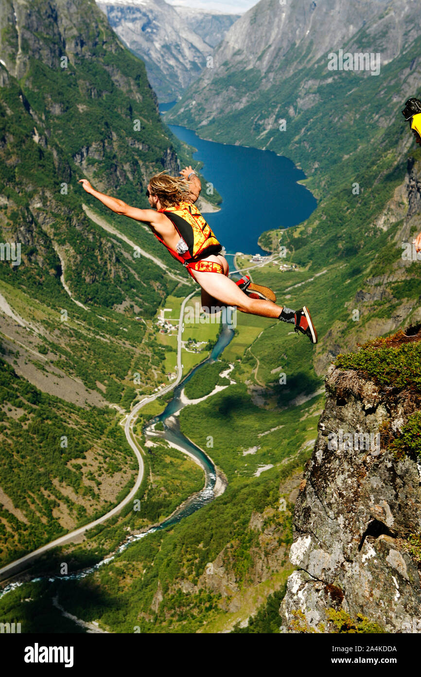 Person jumping from cliff river hi-res stock photography and images - Alamy