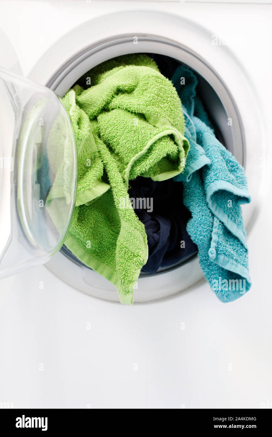 Laundry in washing machine Stock Photo - Alamy