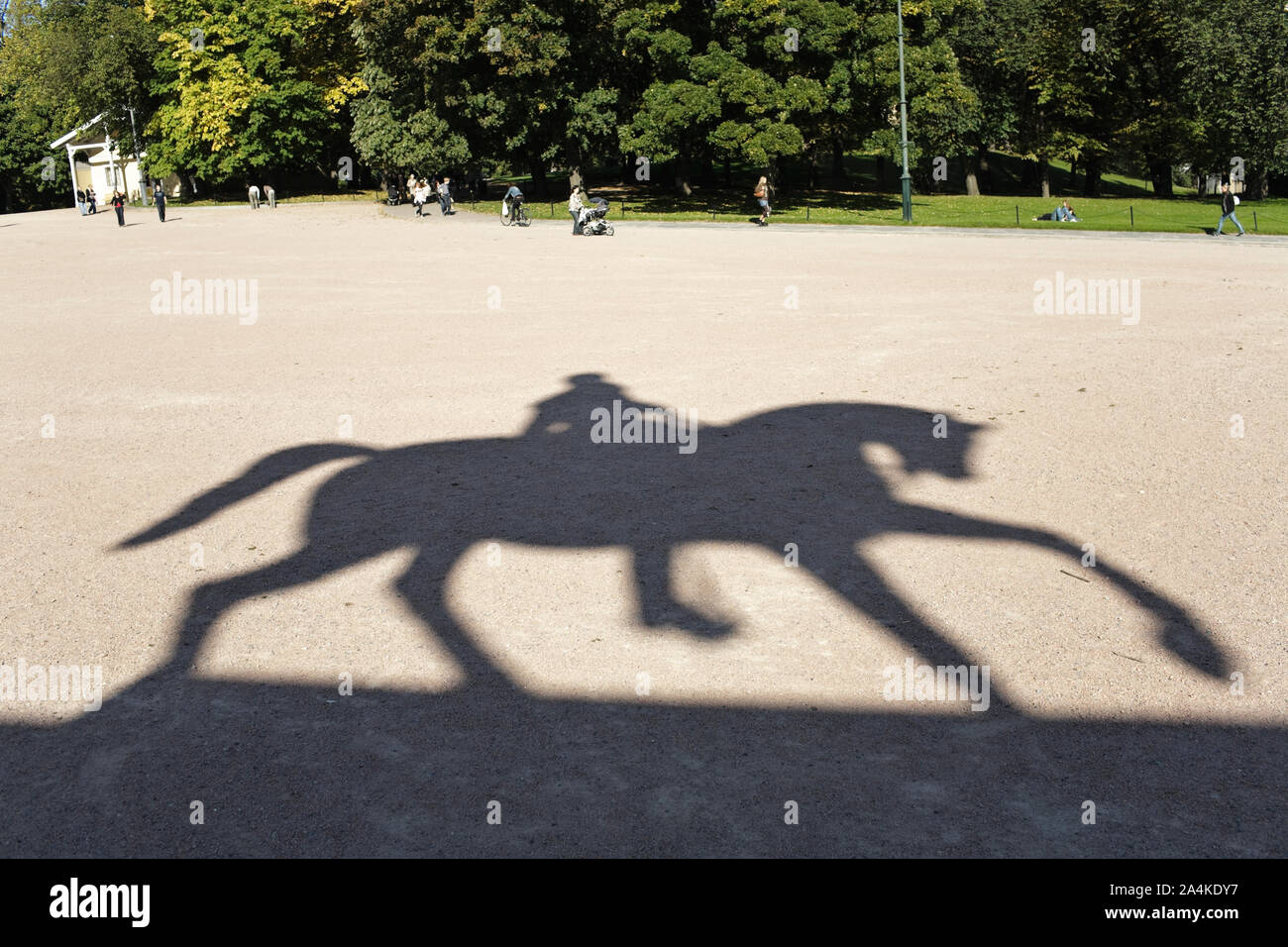 Shadow of the statue of king Karl Johan on horseback in front of the ...