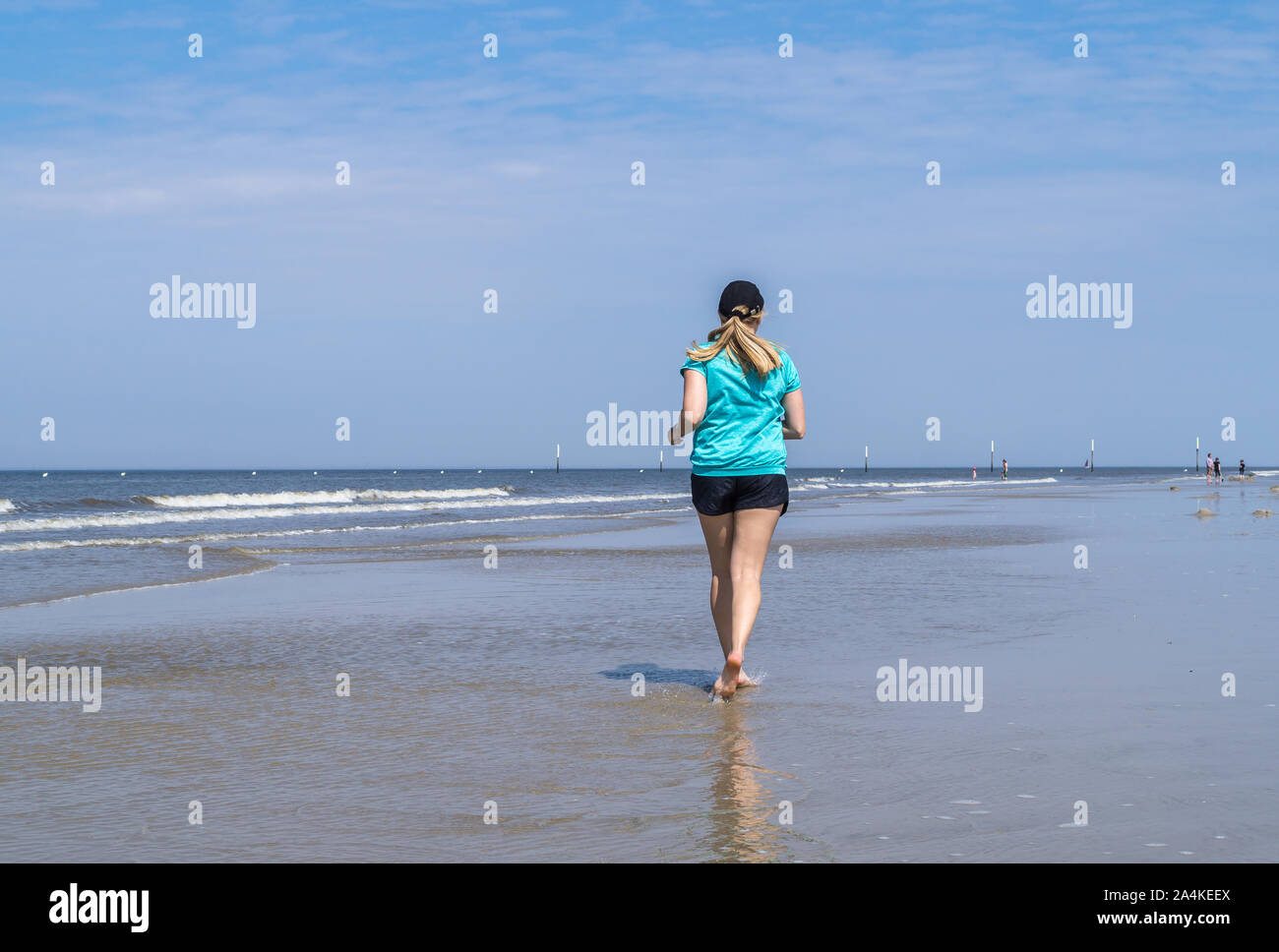 Jogging at the North Sea Beach Stock Photo - Alamy