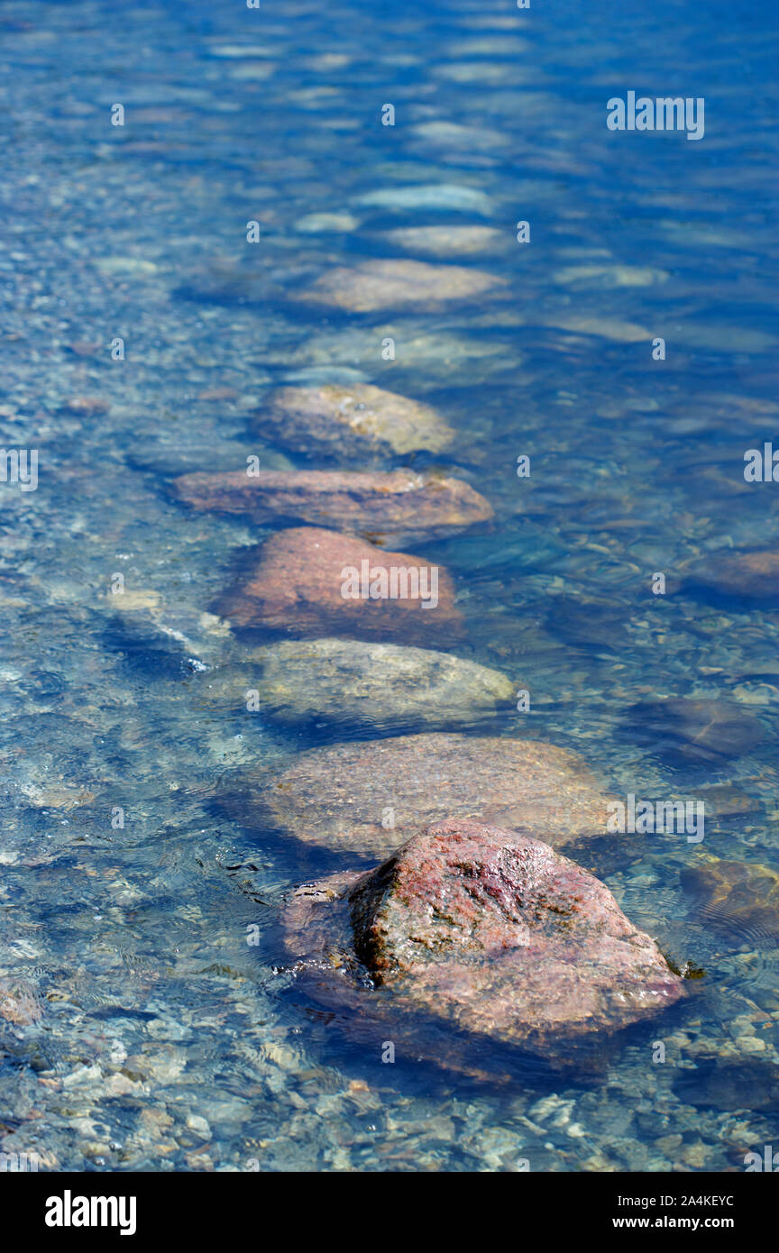 Pebbles in a row - in a line Stock Photo - Alamy